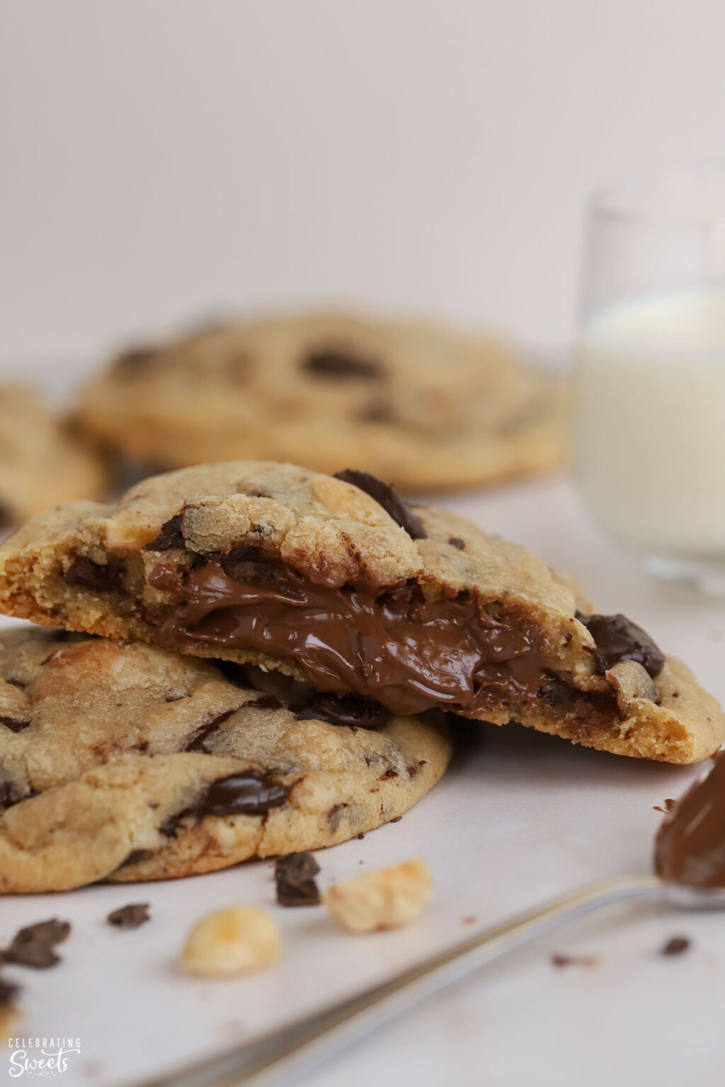 Nutella Stuffed Chocolate Chip Cookies - Celebrating Sweets